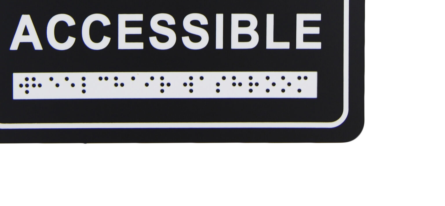 Washroom Signage – Wheelchair with Braille Emboss – Frost